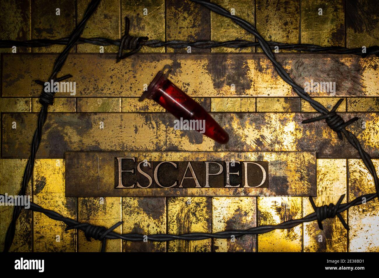 Escaped text with red fluid filled laboratory vial on vintage textured ...