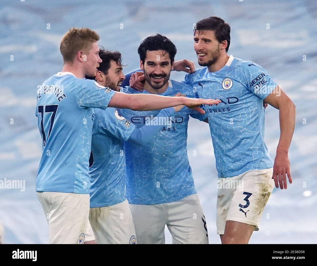 Manchester City's Ilkay Gundogan (centre) celebrates scoring his side's ...