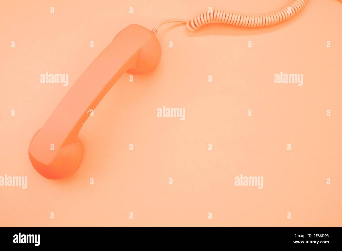 A classic handset on pastel orange background for a copy space Stock ...