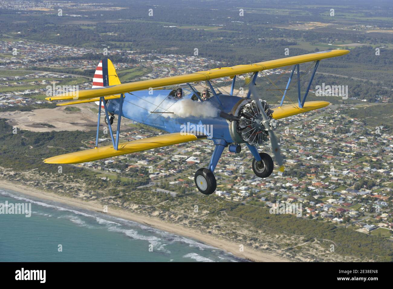 A 1940's Boeing N2S Stearman biplane in US Army colours, using display ...
