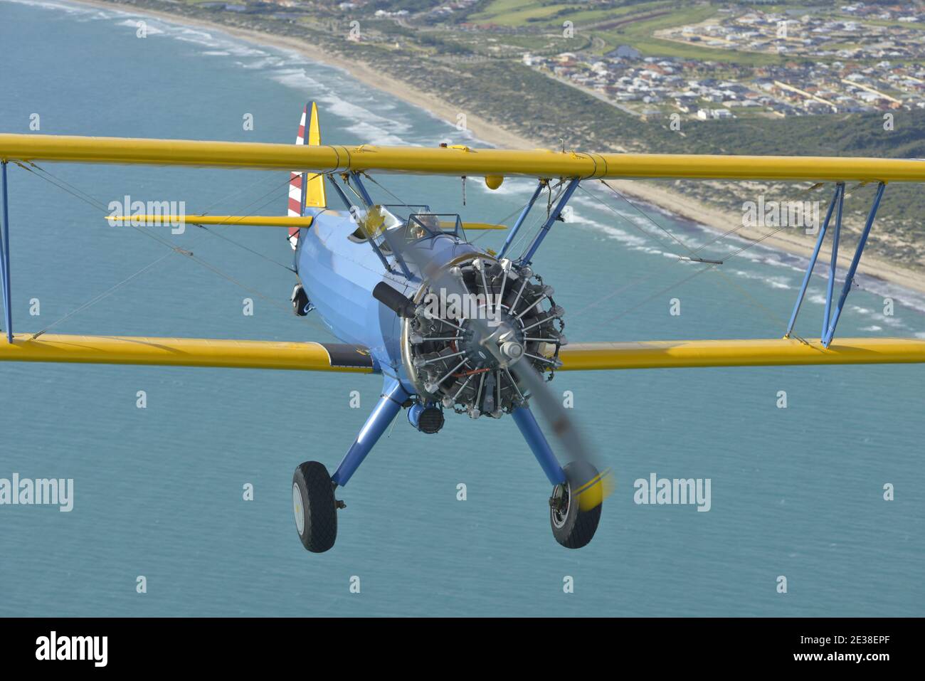 A 1940's Boeing N2S Stearman biplane in US Army colours, using display ...