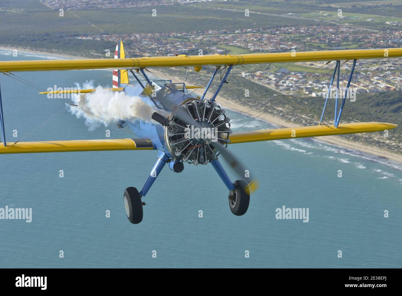 A 1940's Boeing N2S Stearman biplane in US Army colours, using display ...
