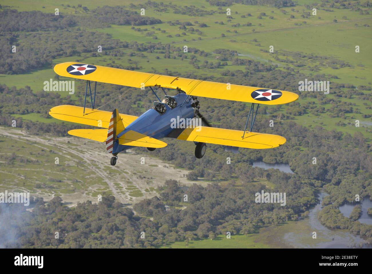 A 1940's Boeing N2S Stearman biplane in US Army colours, using display ...