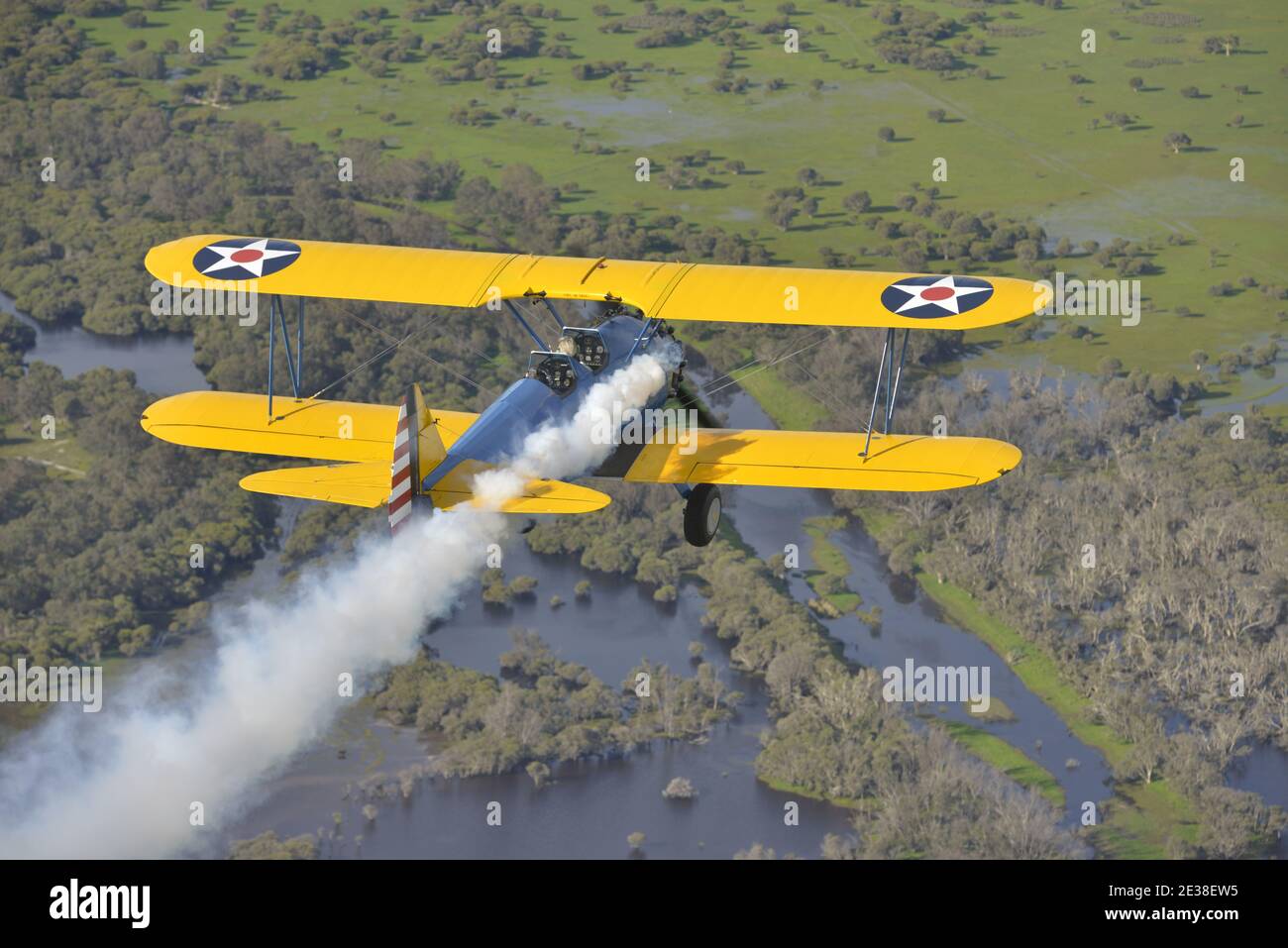 A 1940's Boeing N2S Stearman biplane in US Army colours, using display ...