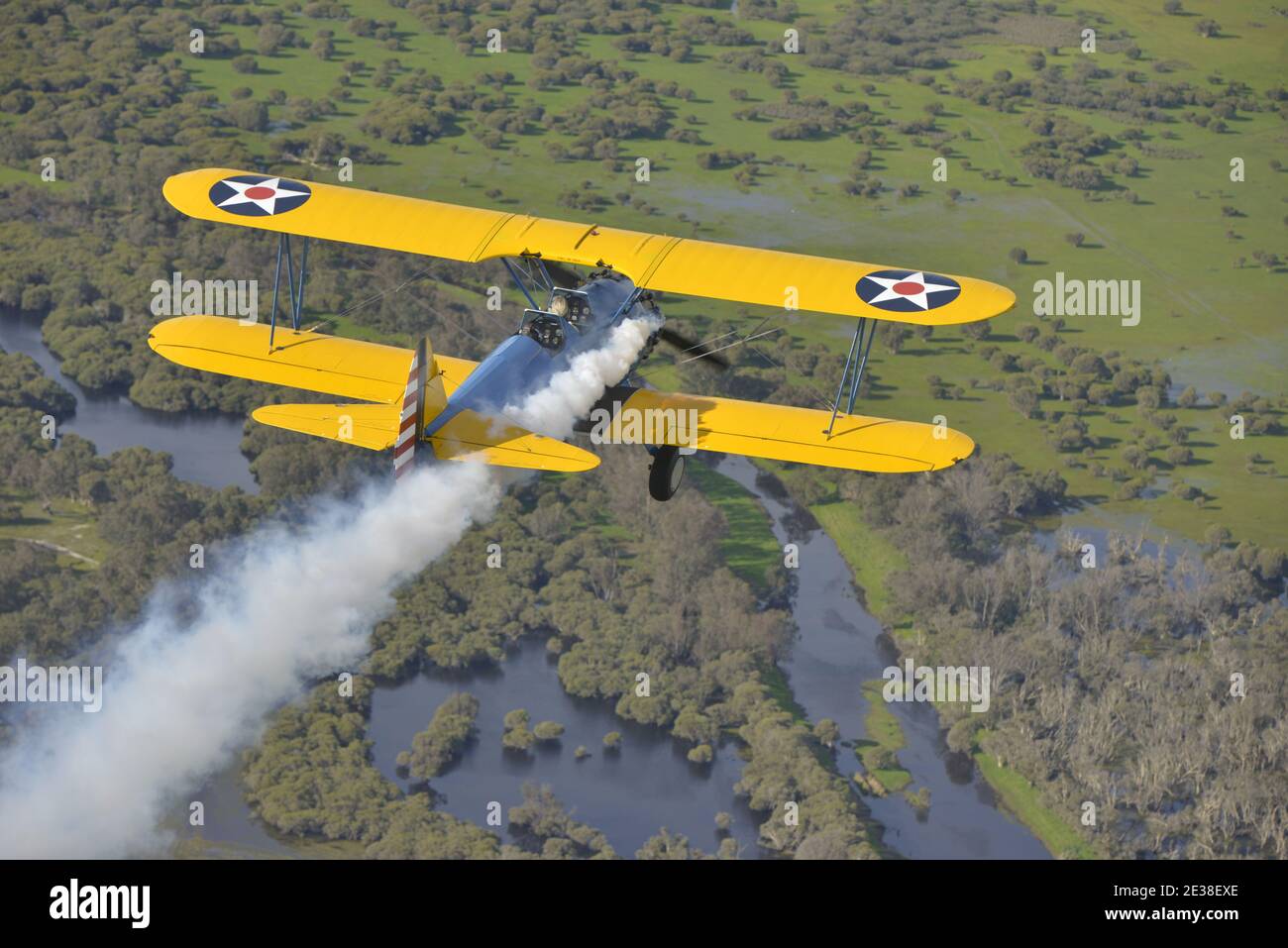 A 1940's Boeing N2S Stearman biplane in US Army colours, using display ...