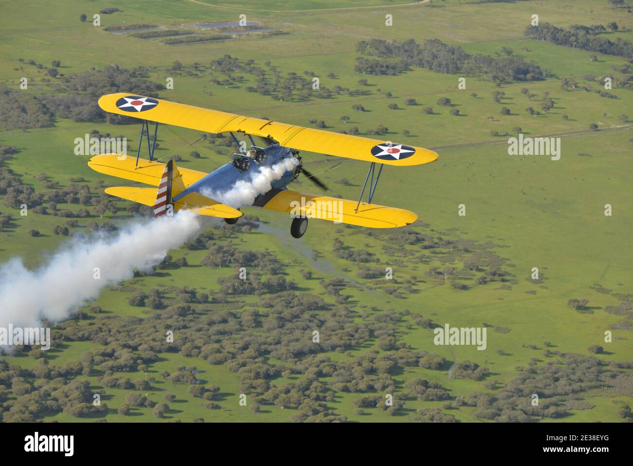 A 1940's Boeing N2S Stearman biplane in US Army colours, using display ...
