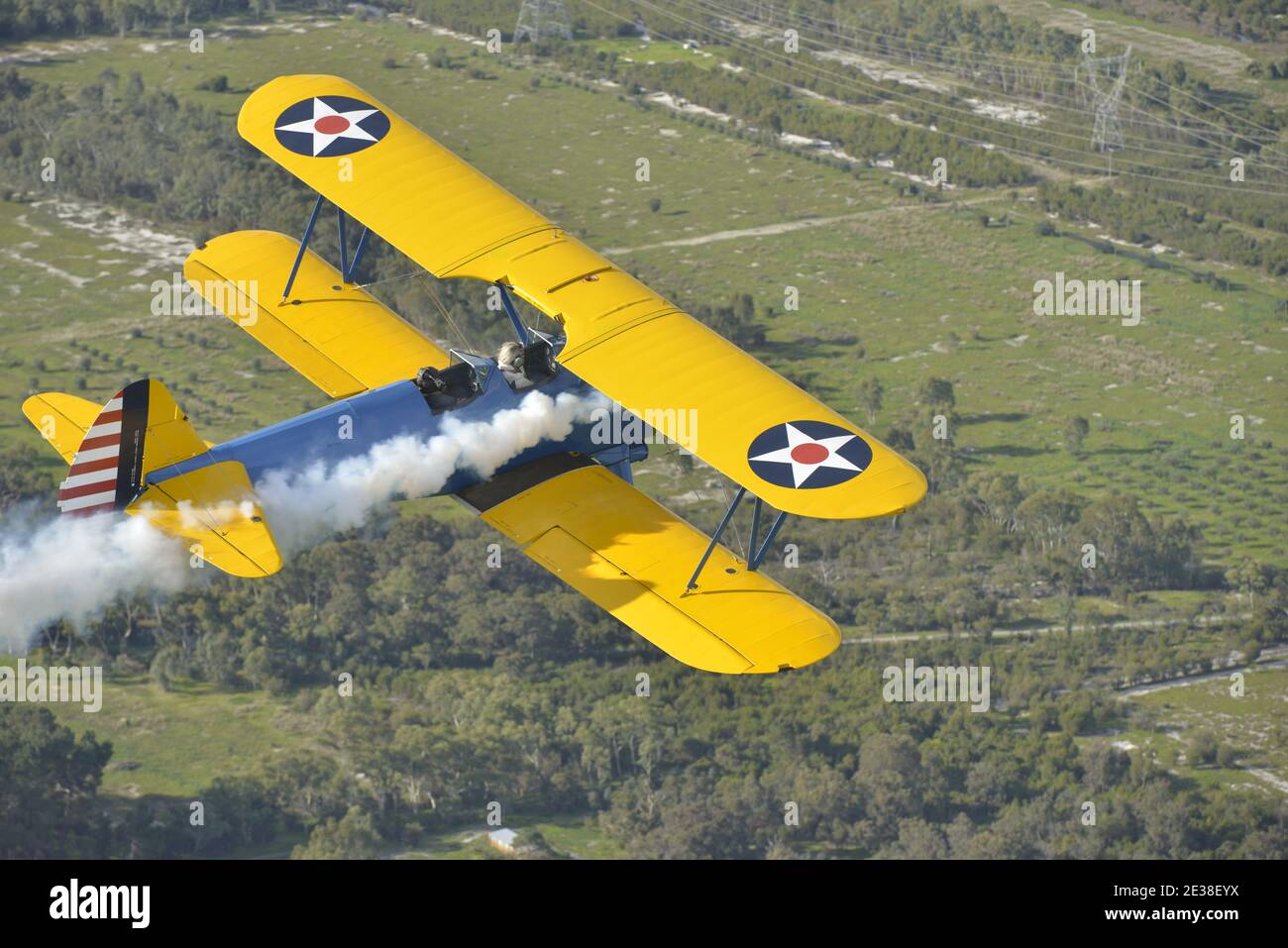 A 1940's Boeing N2S Stearman biplane in US Army colours, using display ...