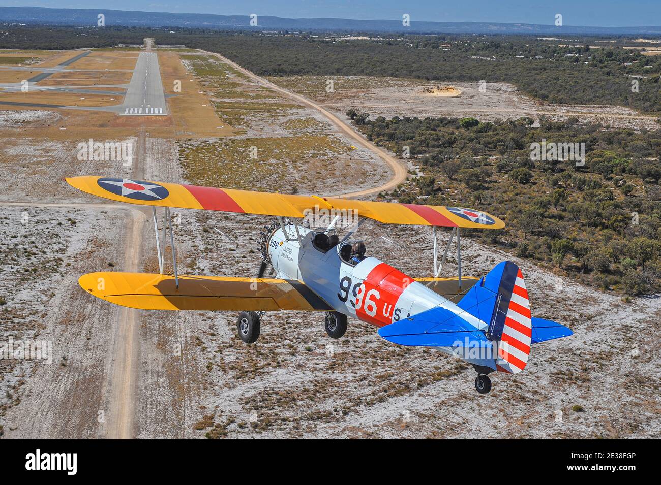 A 1940's Boeing N2S Stearman biplane in US Army colours, using display ...