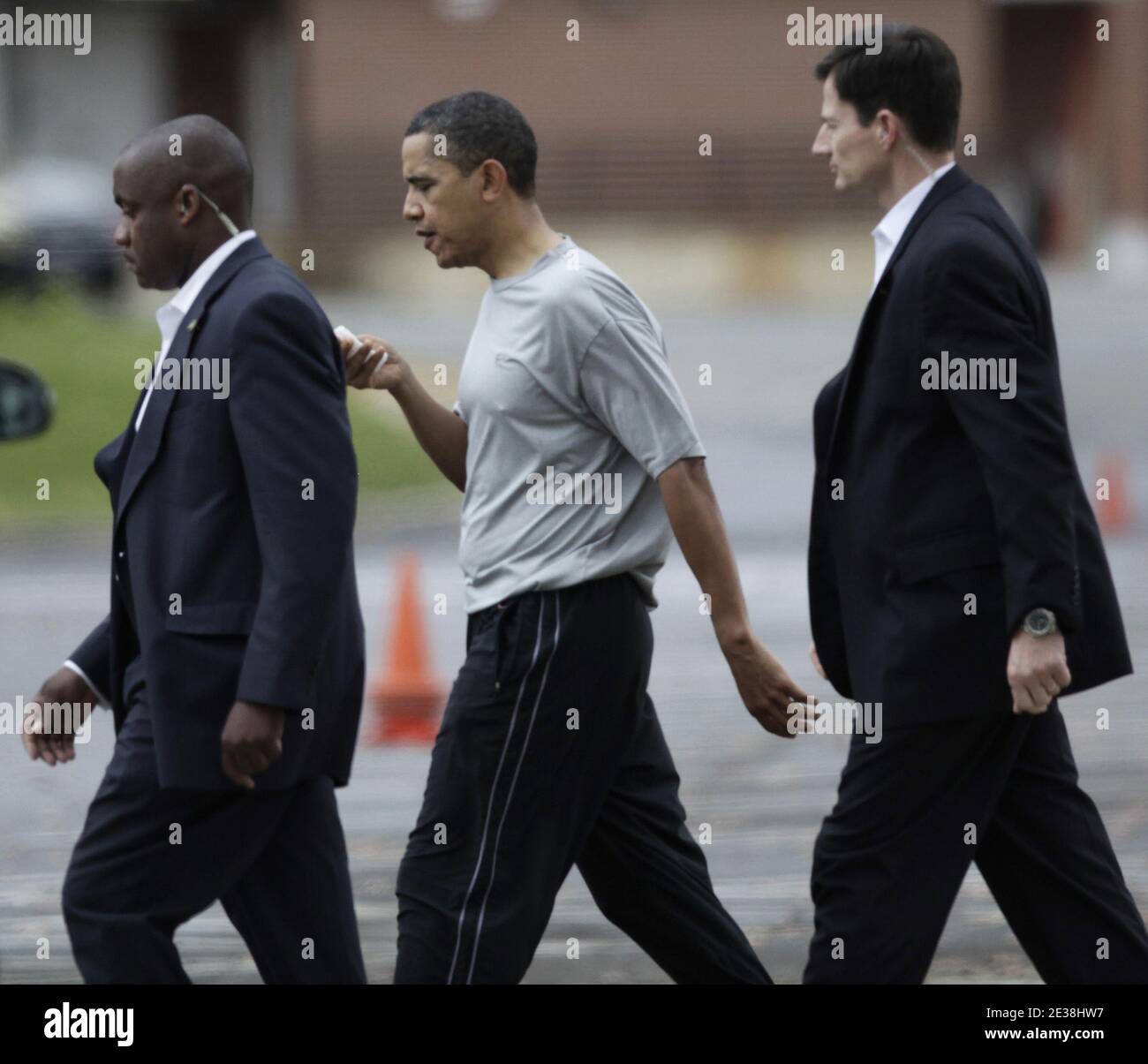 U.S. President Barack Obama (C) leaves after playing basketball at Ft ...