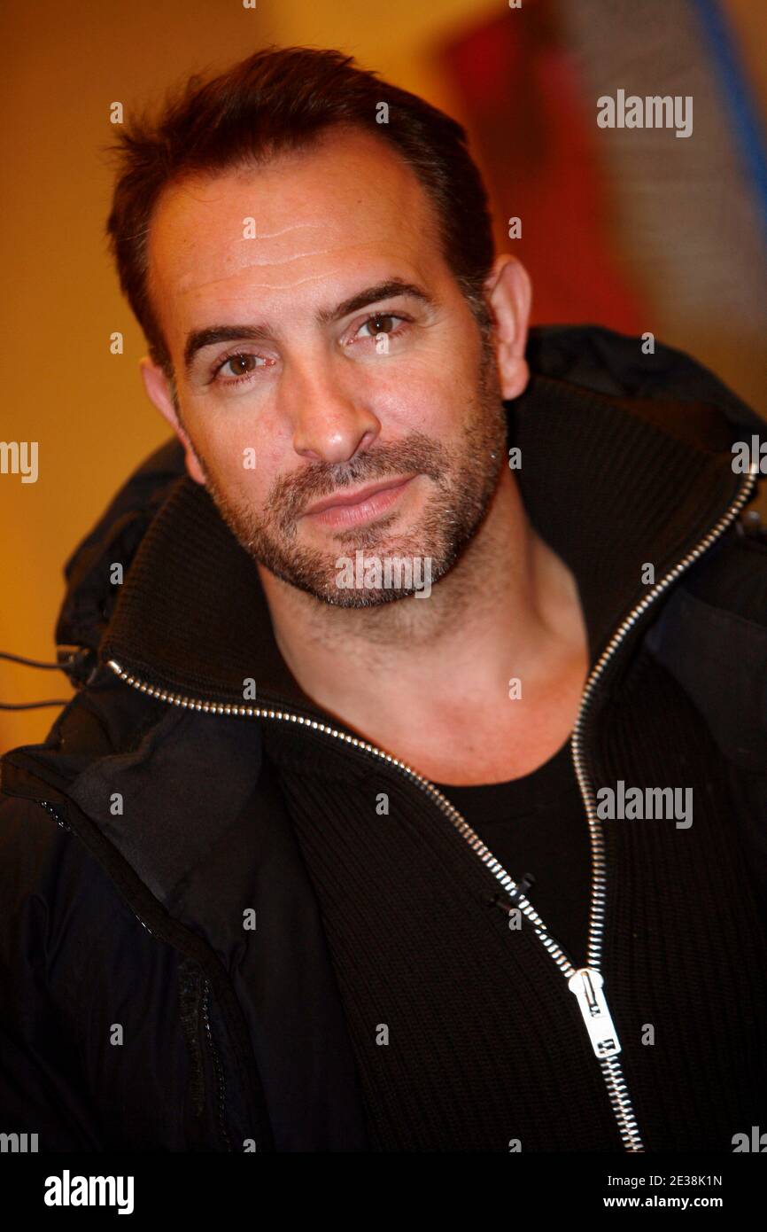 French actor Jean Dujardin poses for photographers during preview ...