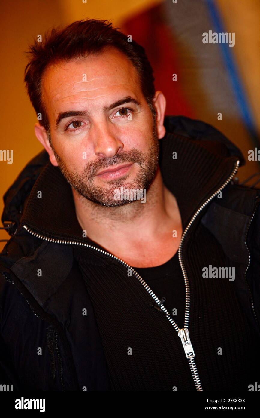 French actor Jean Dujardin poses for photographers during preview ...