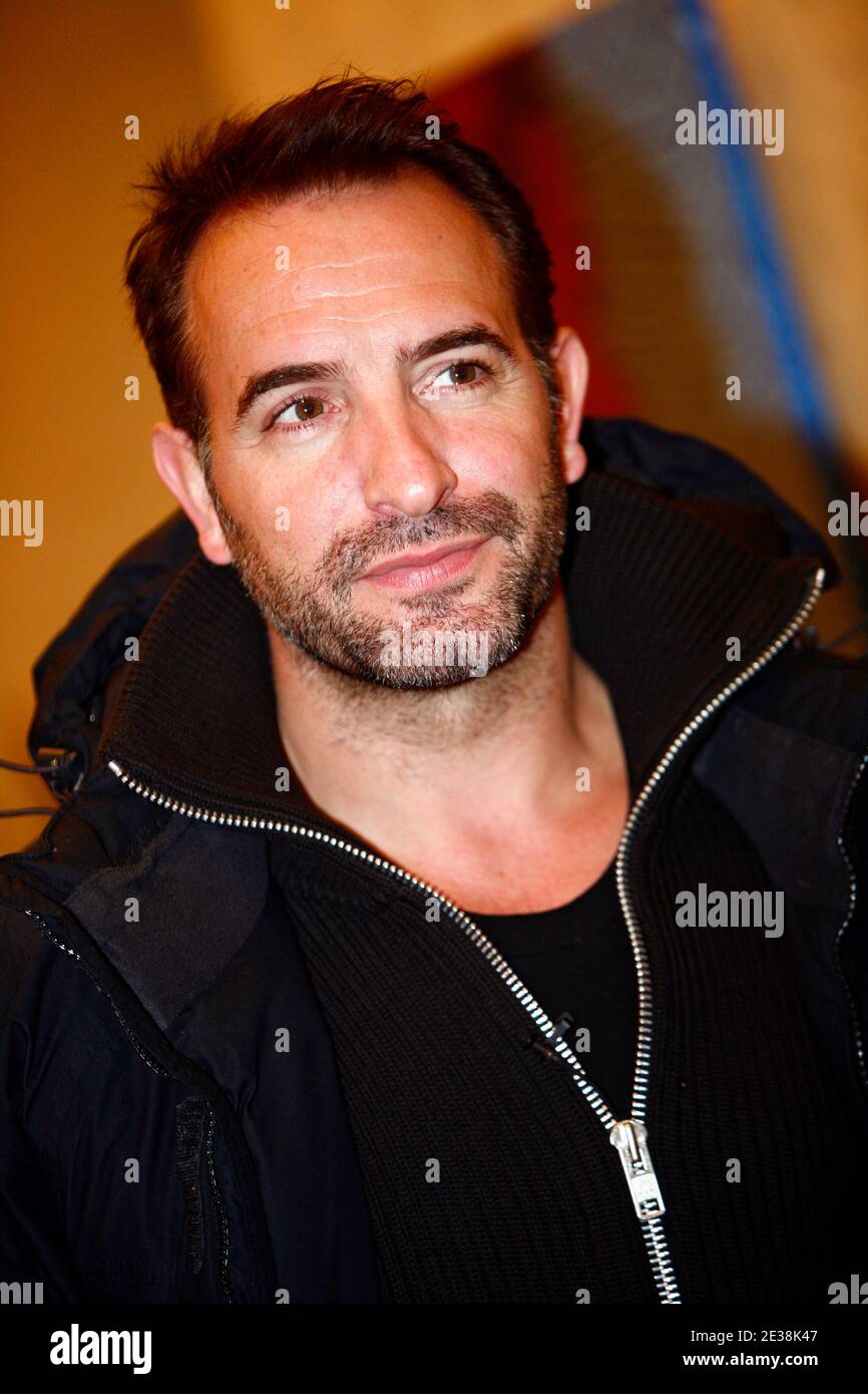 French actor Jean Dujardin poses for photographers during preview ...