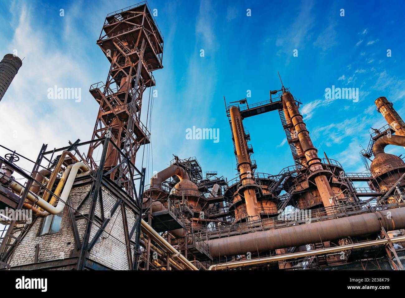 Metallurgical plant or factory blast furnace and smokestacks ...