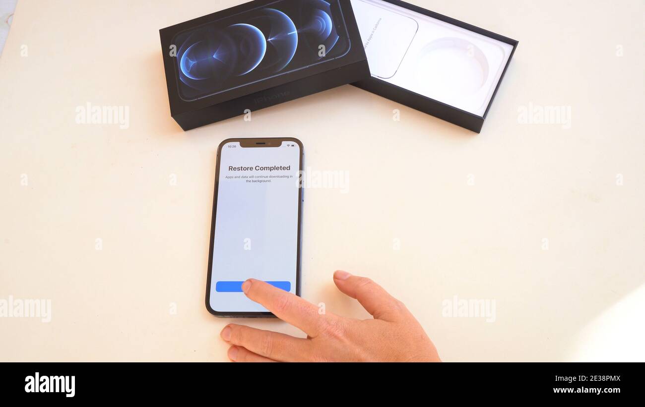 Iphone 12 blue hi-res stock photography and images - Alamy