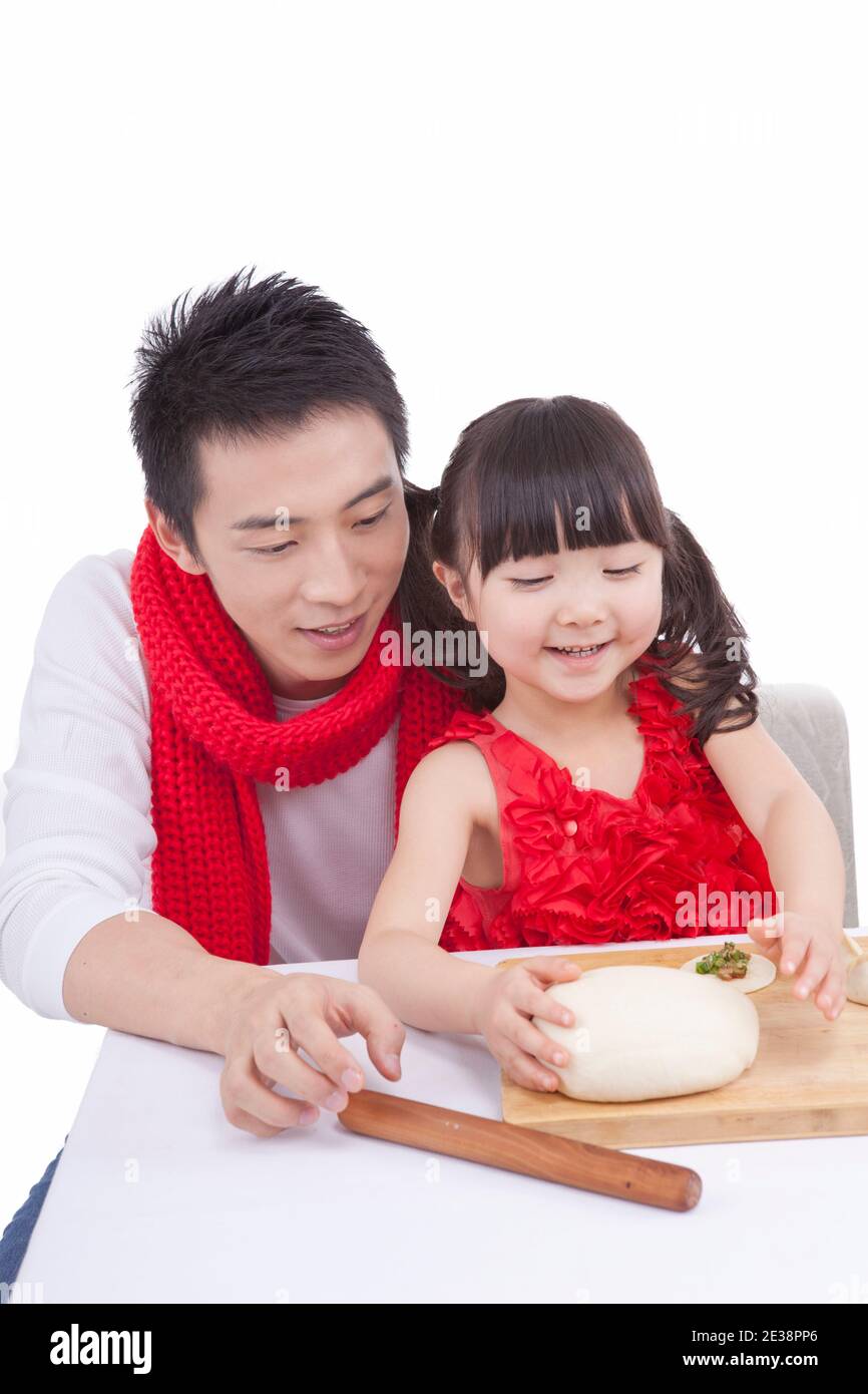 Chinese family eating dumplings hi-res stock photography and images - Alamy