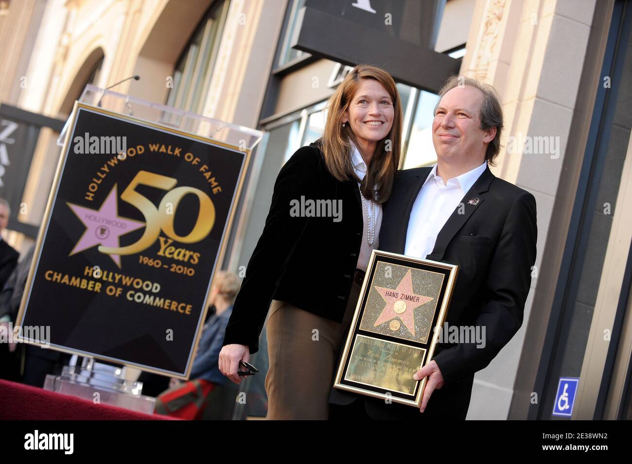 Composer Hans Zimmer, posing with his wife Suzanne, is honored with a ...