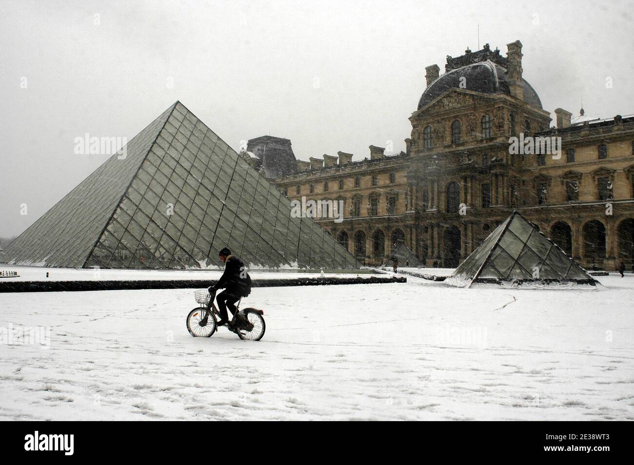 The Louvre museum under the snow in Paris, France on December 9, 2010 ...
