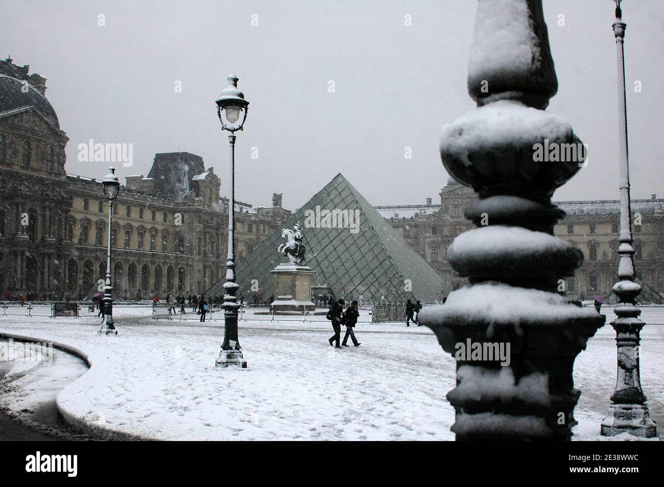 The Louvre museum under the snow in Paris, France on December 9, 2010 ...