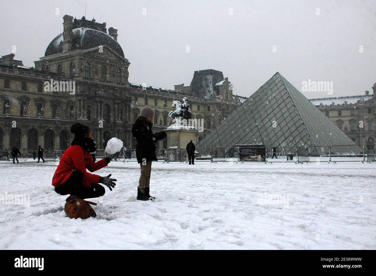 The Louvre museum under the snow in Paris, France on December 9, 2010 ...