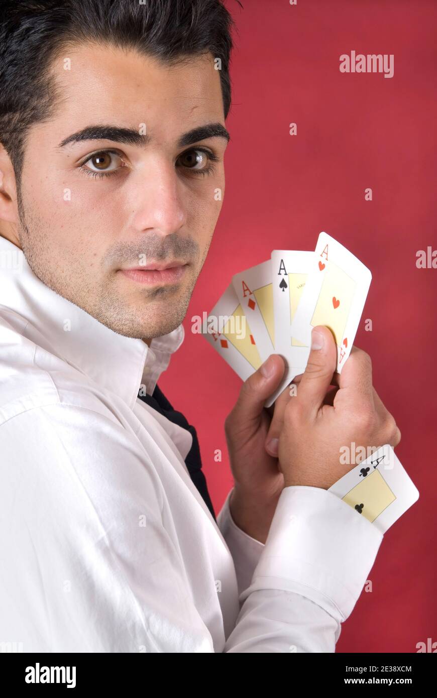 poker player with aces and an ace in his sleeve Stock Photo - Alamy