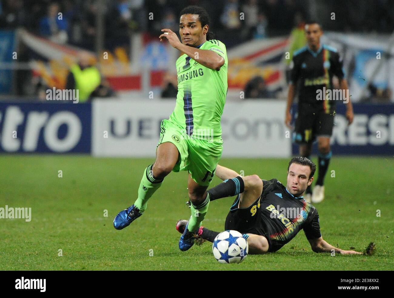 Chelsea's Florent Malouda is tackled by OM's Mathieu Valbuena during ...