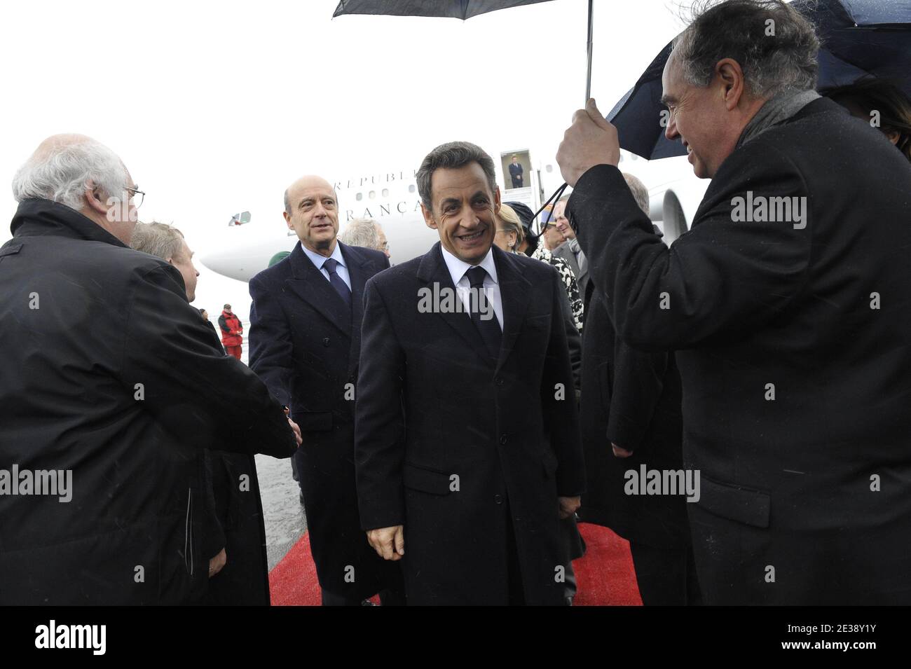 French President Nicolas Sarkozy and Alain Juppe pictured as he arrives ...