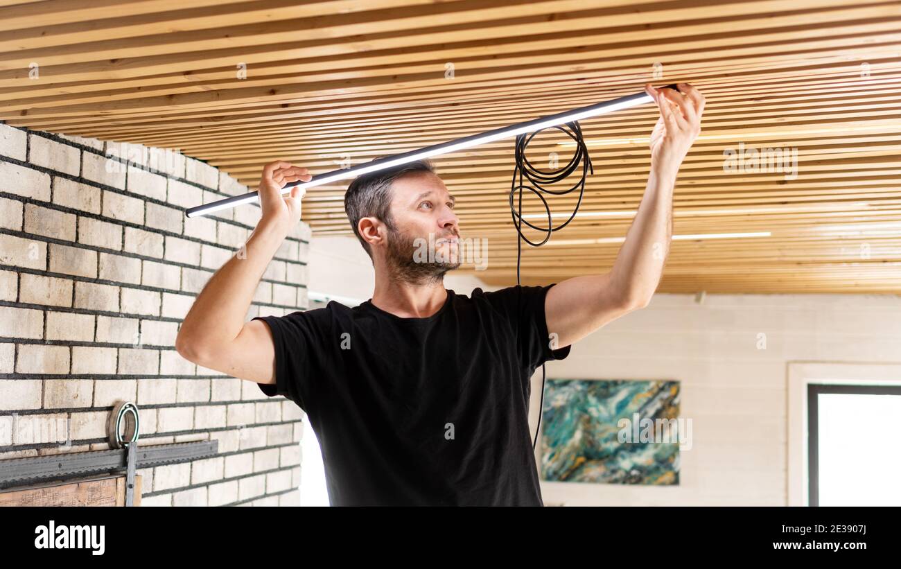 Electrician at work. Service for the repair of electrical wiring and ...