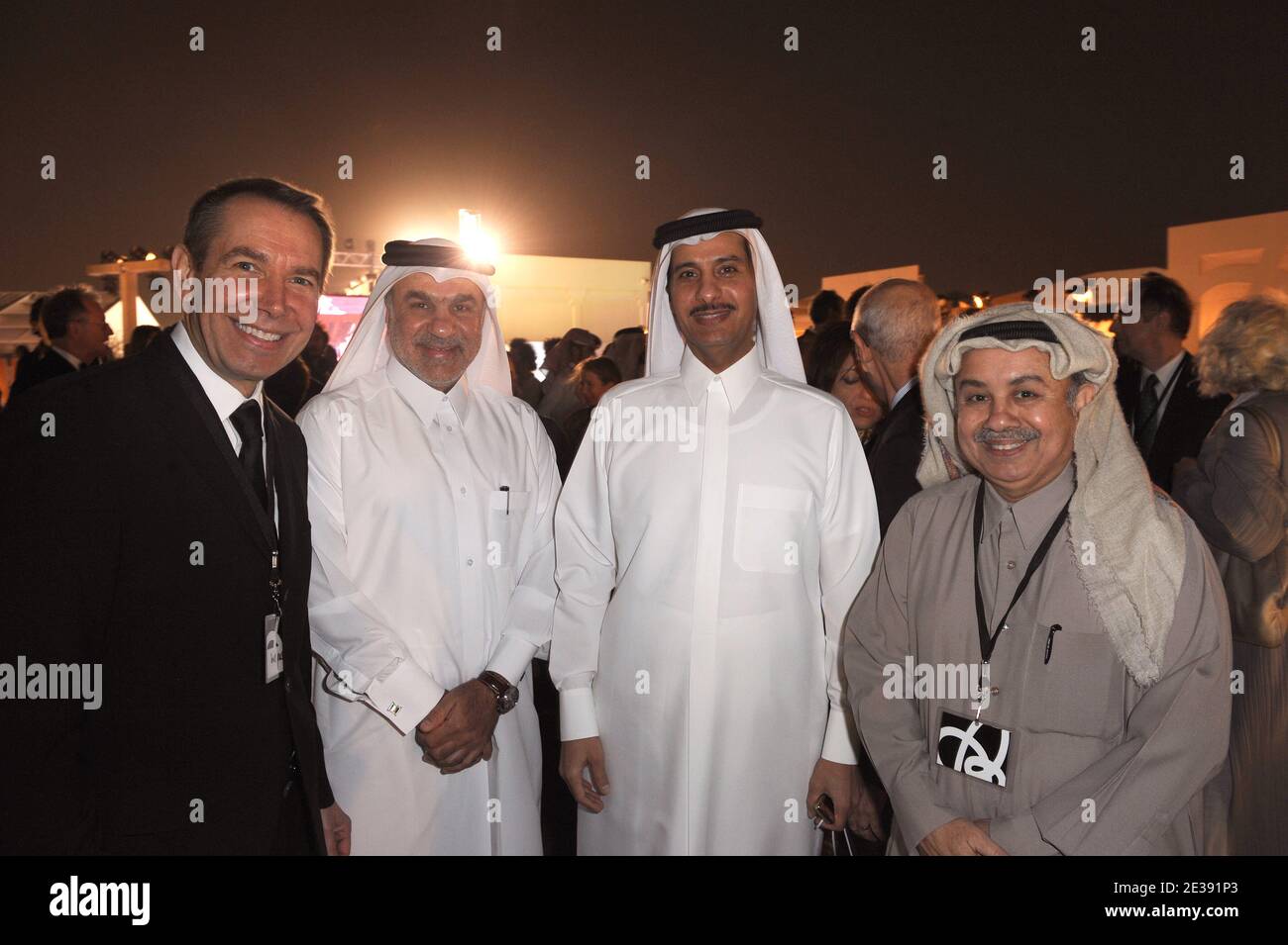 L-R : Jeff Koons, Qatar Museum Authority CEO Abdullah Al Najjar, and ...
