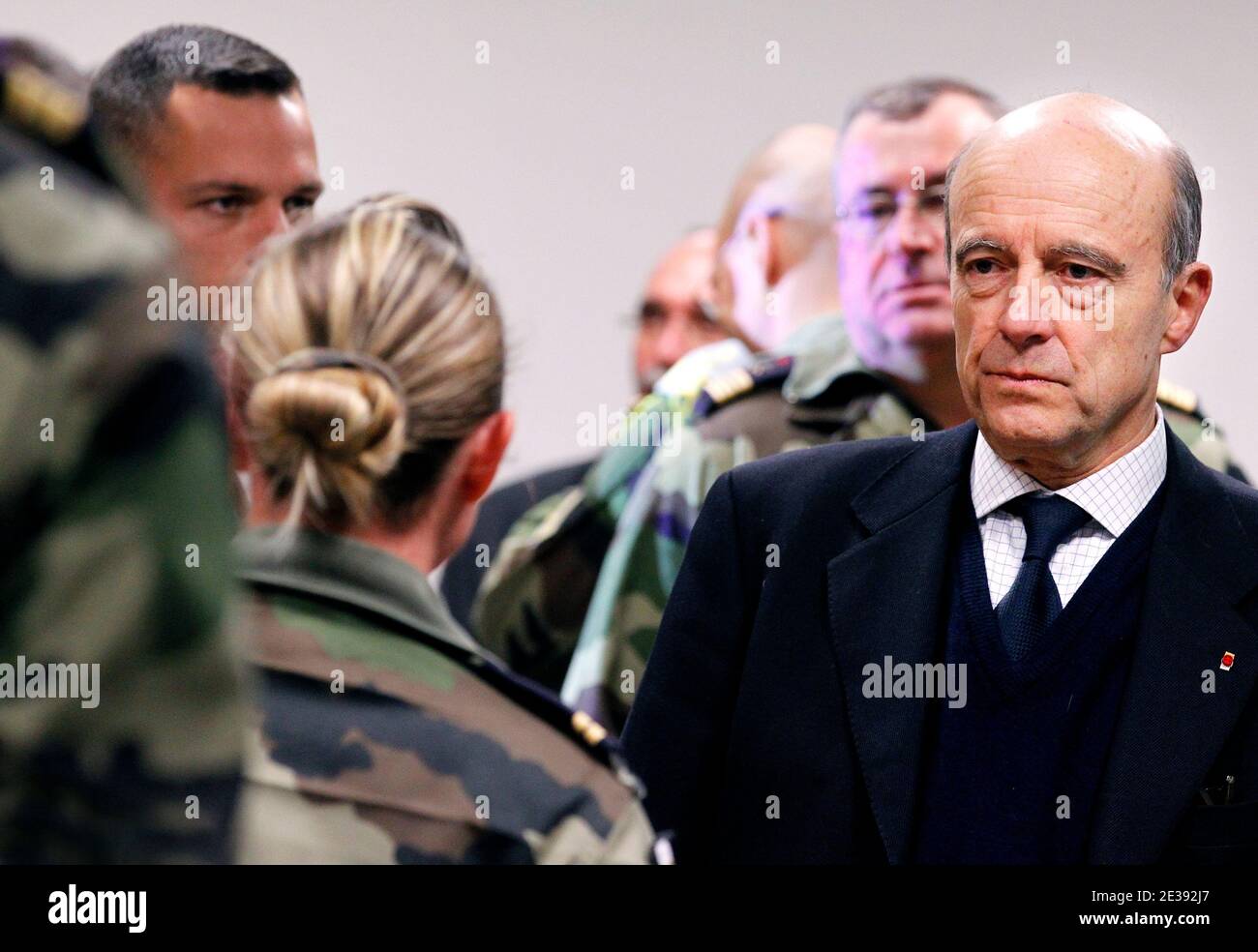 French Defence Minister Alain Juppe meets French soldiers, on December ...