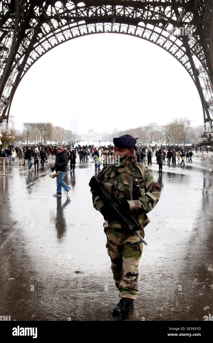 French Army soldiers patrol the Eiffel tower in Paris, France on ...