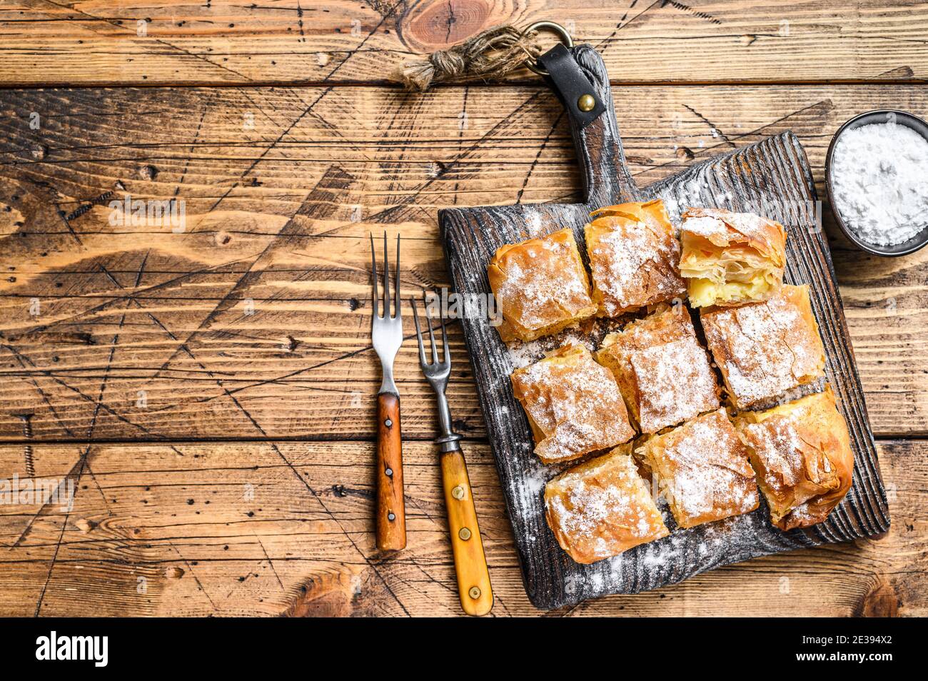 Greek pastry Bougatsa with phyllo dough and semolina custard cream ...