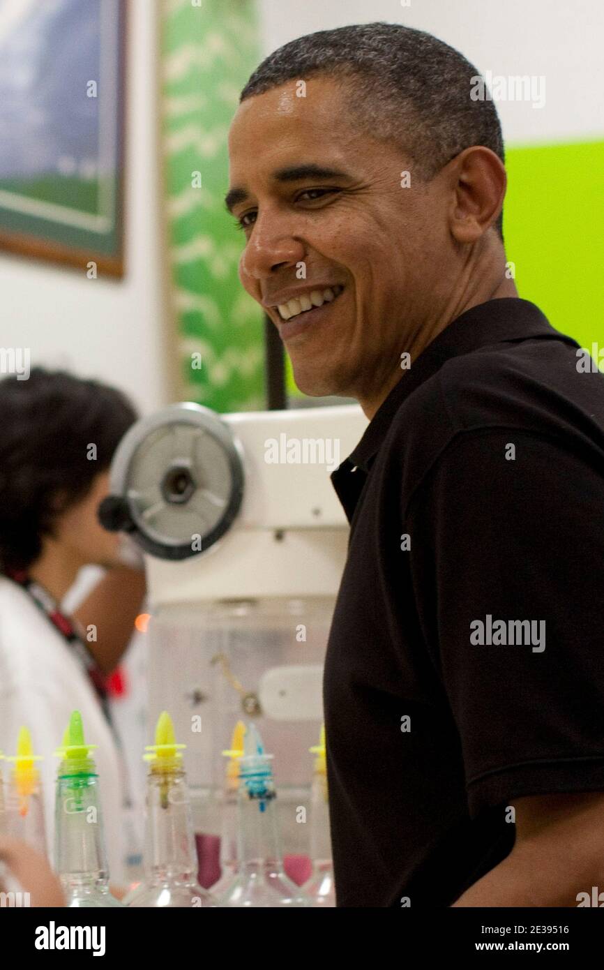 US President Barack Obama smiles while ordering Shave Ice at Island ...