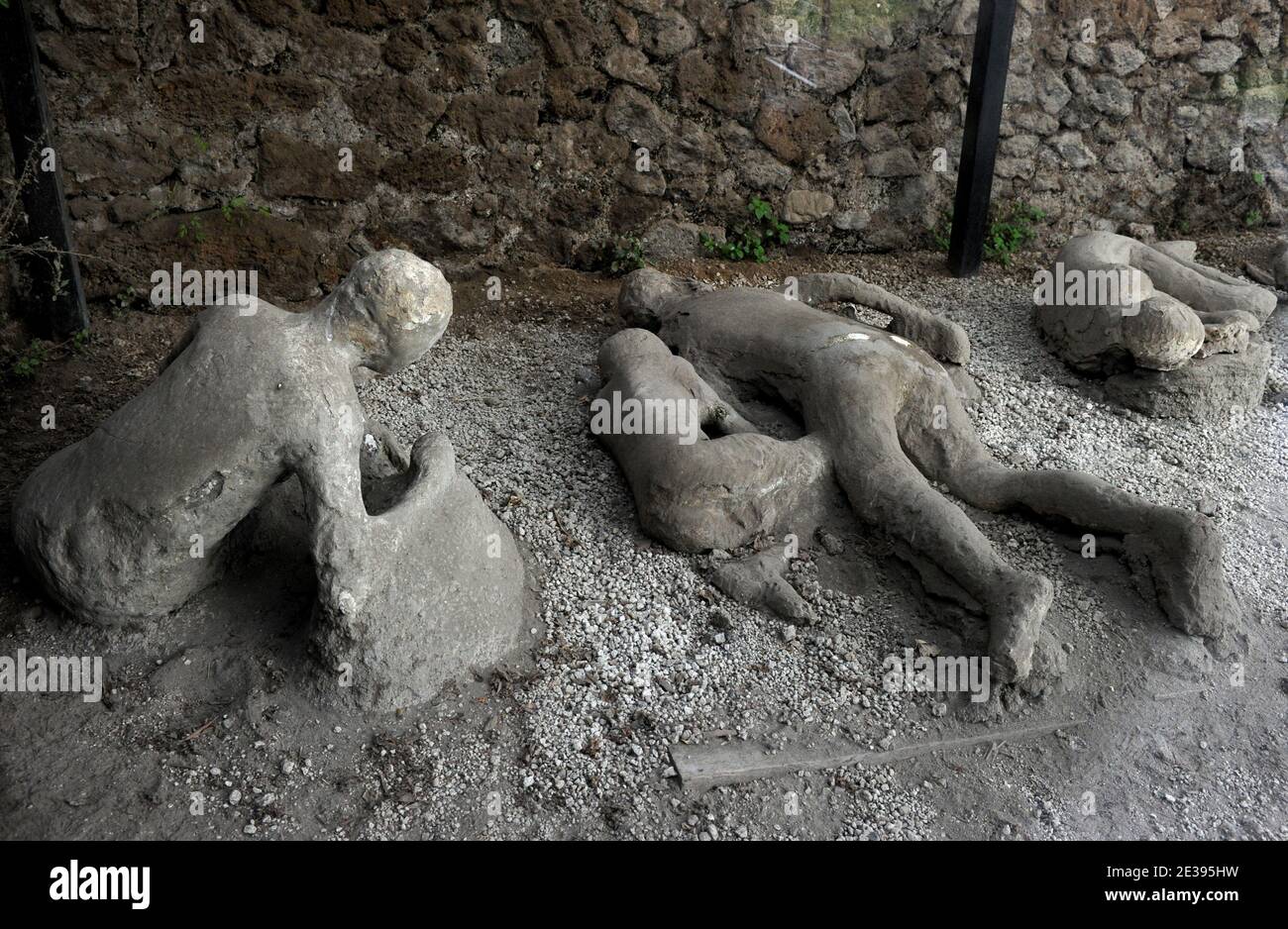 Plaster casts of victims ,overcome by the fury of the eruption while ...