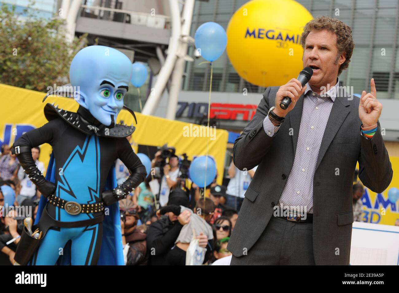 Actor Will Ferrell stand next to costumed superhero character 'Megamind ...