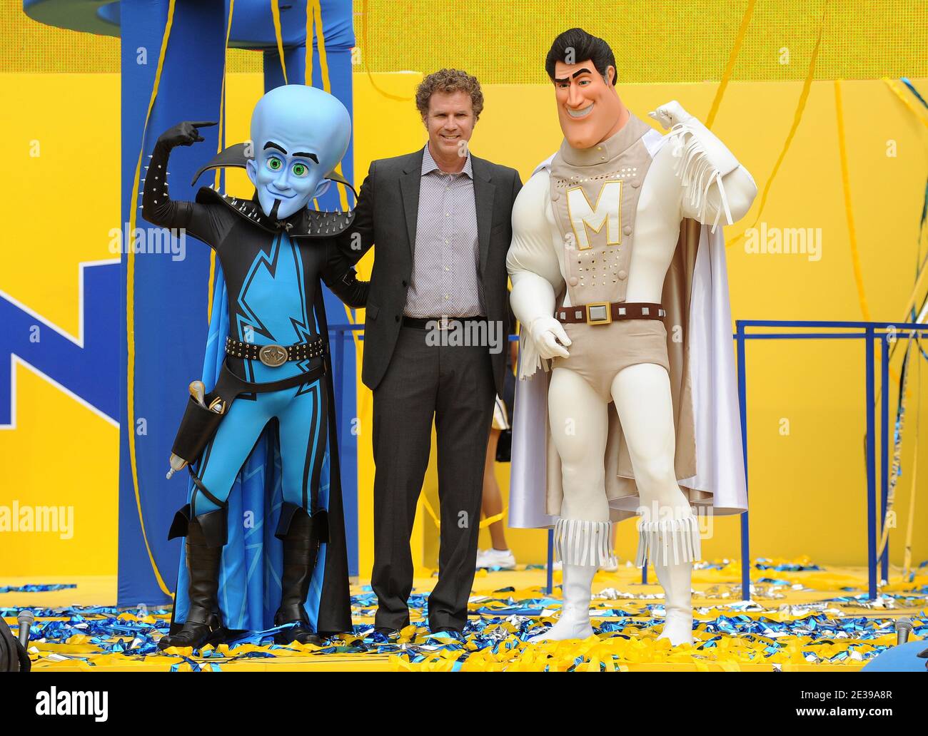 Actor Will Ferrell stand next to costumed superhero character 'Megamind ...
