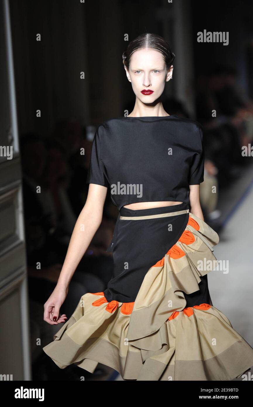 A model displays a creation by designer Stephano Pilati for Yves Saint ...