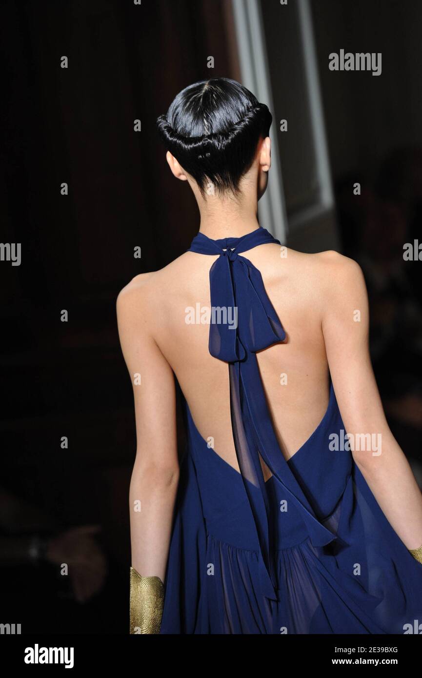 A model displays a creation by designer Stephano Pilati for Yves Saint ...