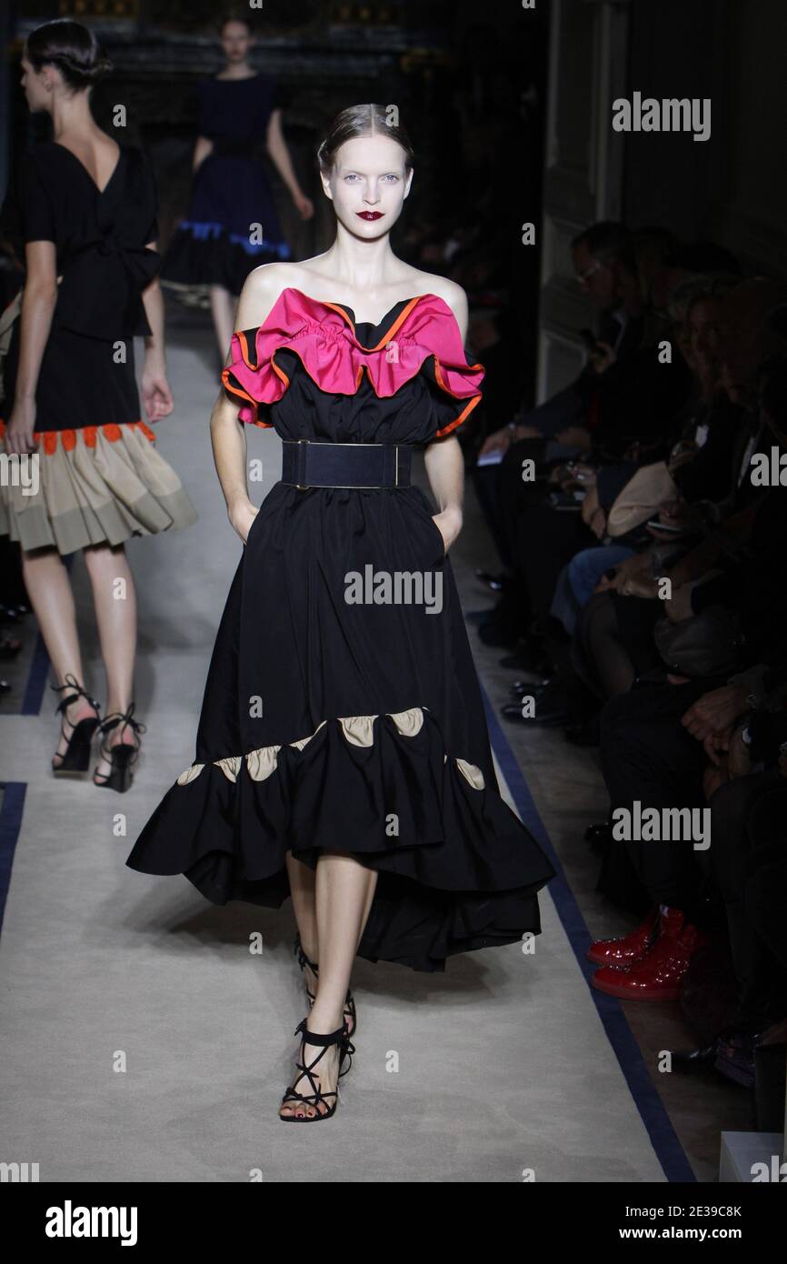 A model displays a creation by designer Stephano Pilati for Yves Saint ...