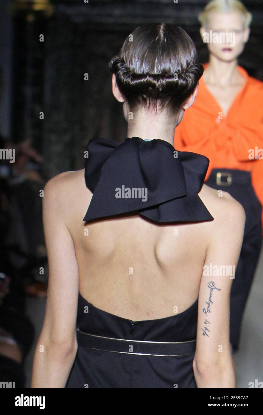 A model displays a creation by designer Stephano Pilati for Yves Saint ...