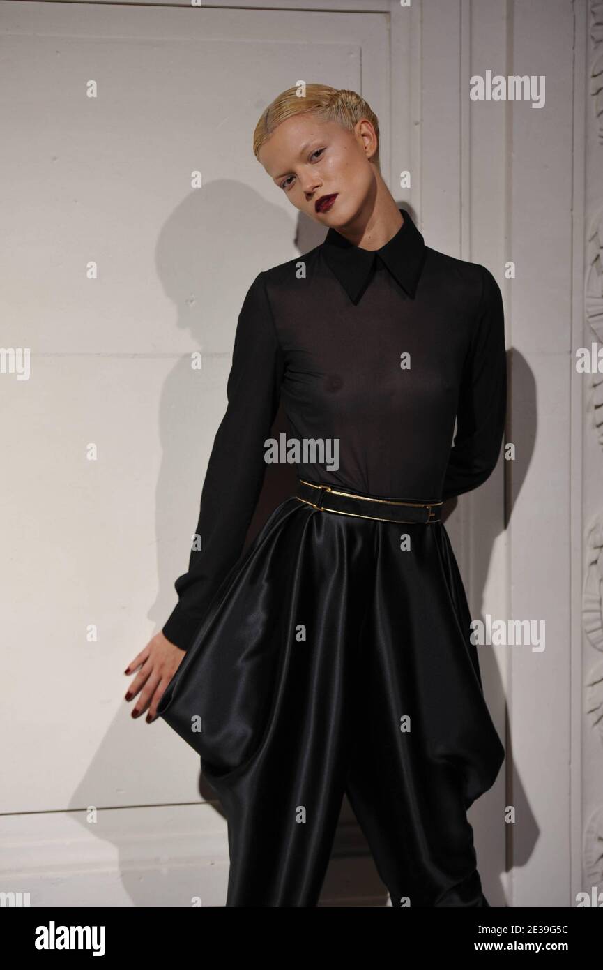 A model Displays a creation by designer Stephano Pilati for Yves Saint ...