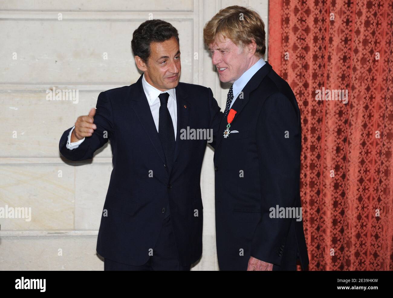 US director and actor Robert Redford is greeted by French President ...