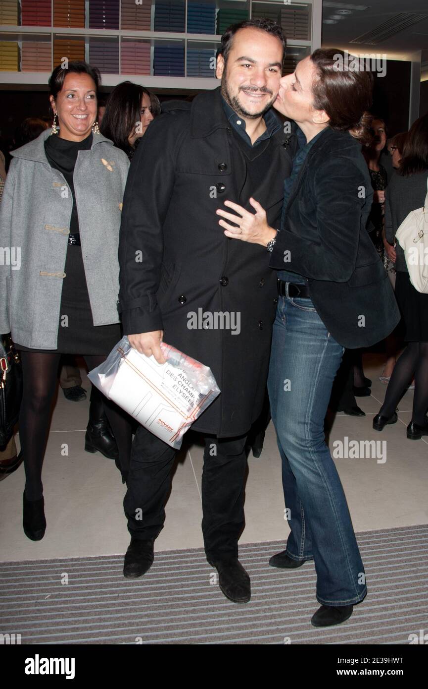 Daphne Roulier and Francois-Xavier Demaison arriving for the opening of ...