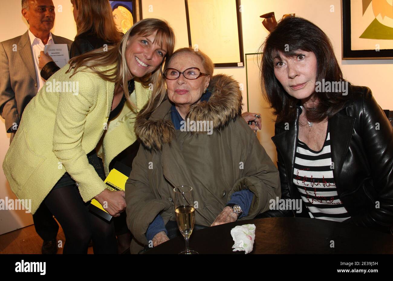French actress Michele Morgan poses with Deborah Marshall and Sabine ...