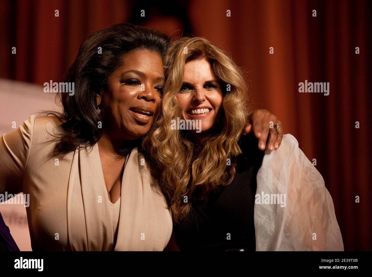 Oprah Winfrey, recipient of a Minerva Awards and Maria Shriver attend ...