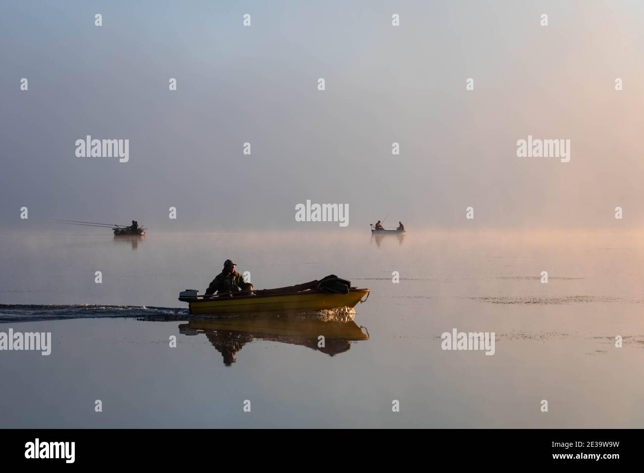 Misty morning fishing boat hi-res stock photography and images - Alamy