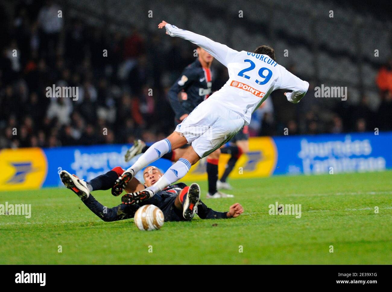 PSG's Guillaume Hoarau and Lyon's Yoann Gourcuff during the French ...