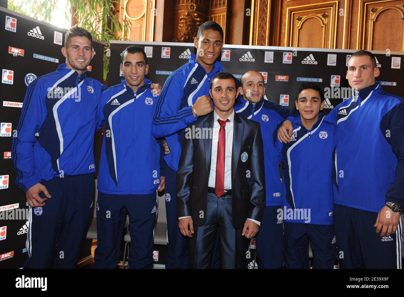 French boxer Brahim Asloum poses with members of Paris United during ...