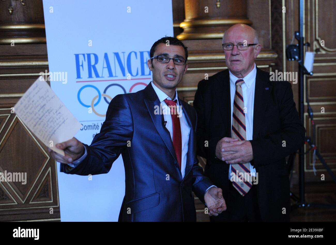 French boxer Brahim Asloum flanked by Vice President of Boxing French ...