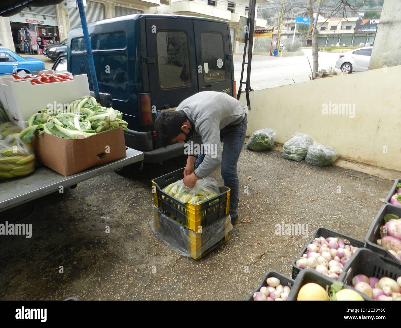 Nabatieh, Lebanon. 17th Jan, 2021. A worker prepares fruits and ...