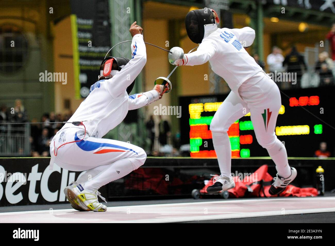 France's Laura Flessel (left) loses against Hungary's Emese Szasz ...